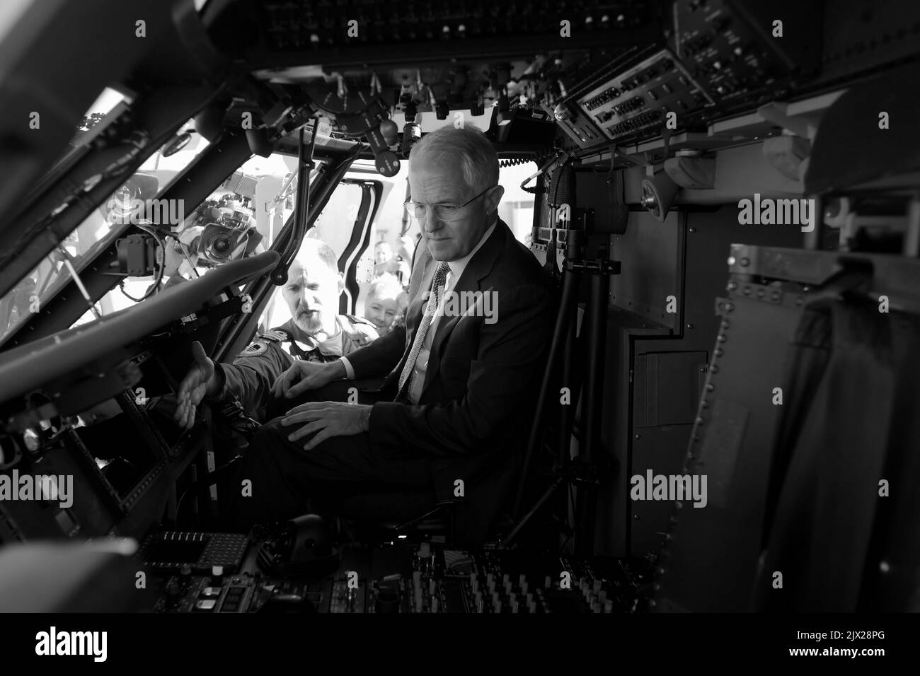 Australian Prime Minister Malcolm Turnbull sits inside the cockpit of a ...