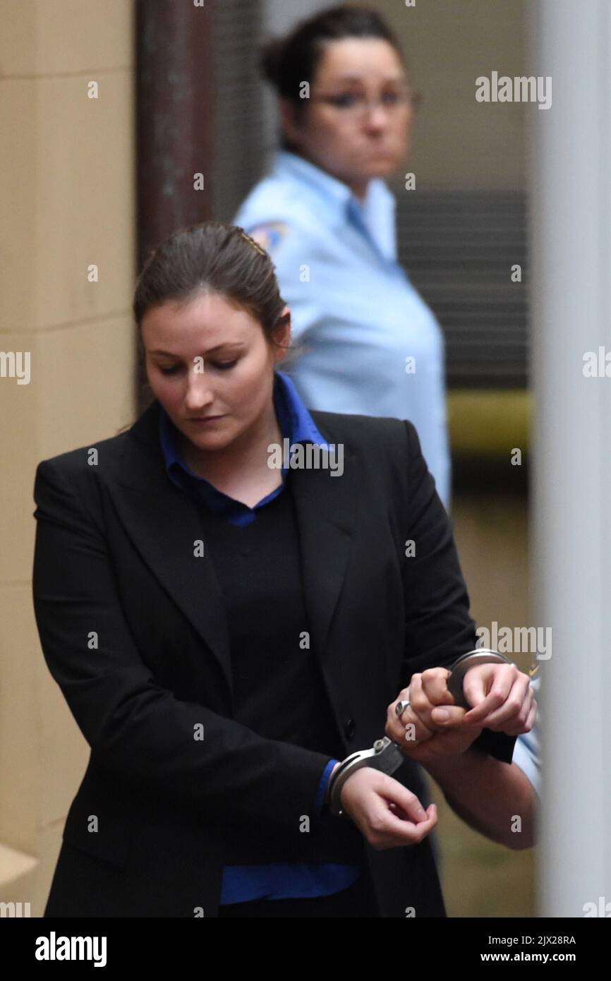 Harriet Wran is escorted to a prison transport vehicle at the NSW Supreme Court in Sydney ...