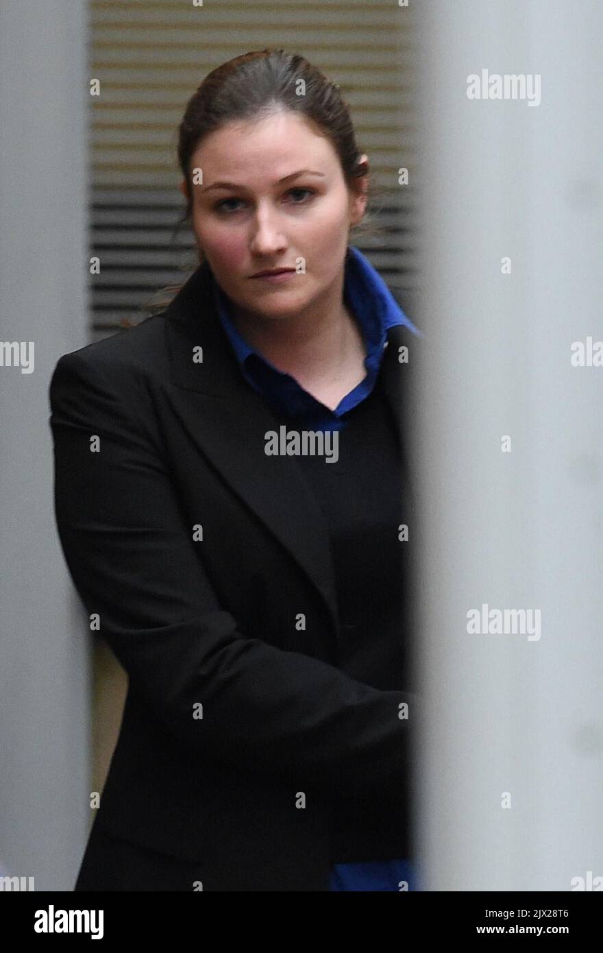 Harriet Wran is escorted to a prison transport vehicle at the NSW Supreme Court in Sydney ...