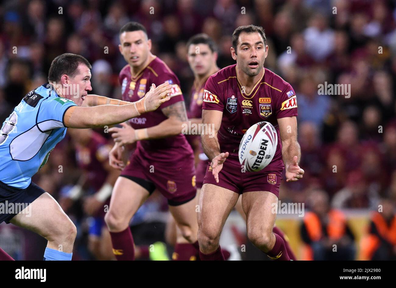 Cameron Smith, Captain of the Queensland Maroons passes the ball during ...