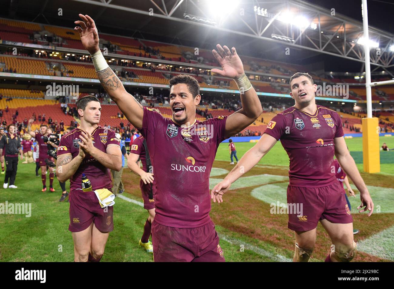Dane Gagai of the Maroons (centre) celebrates following State of Origin ...
