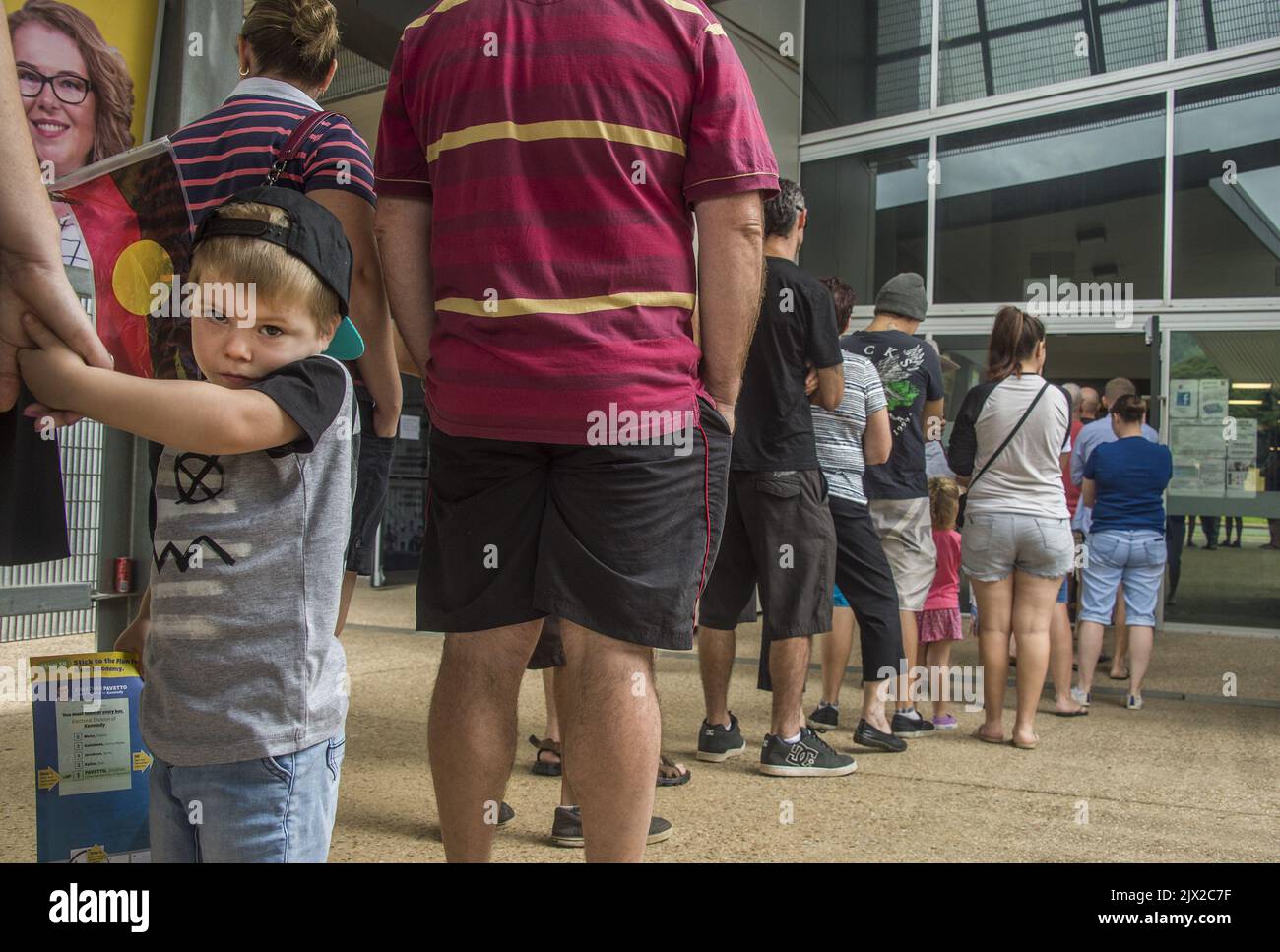 Crowds queue to vote at the polling booth which serves both the Kennedy ...