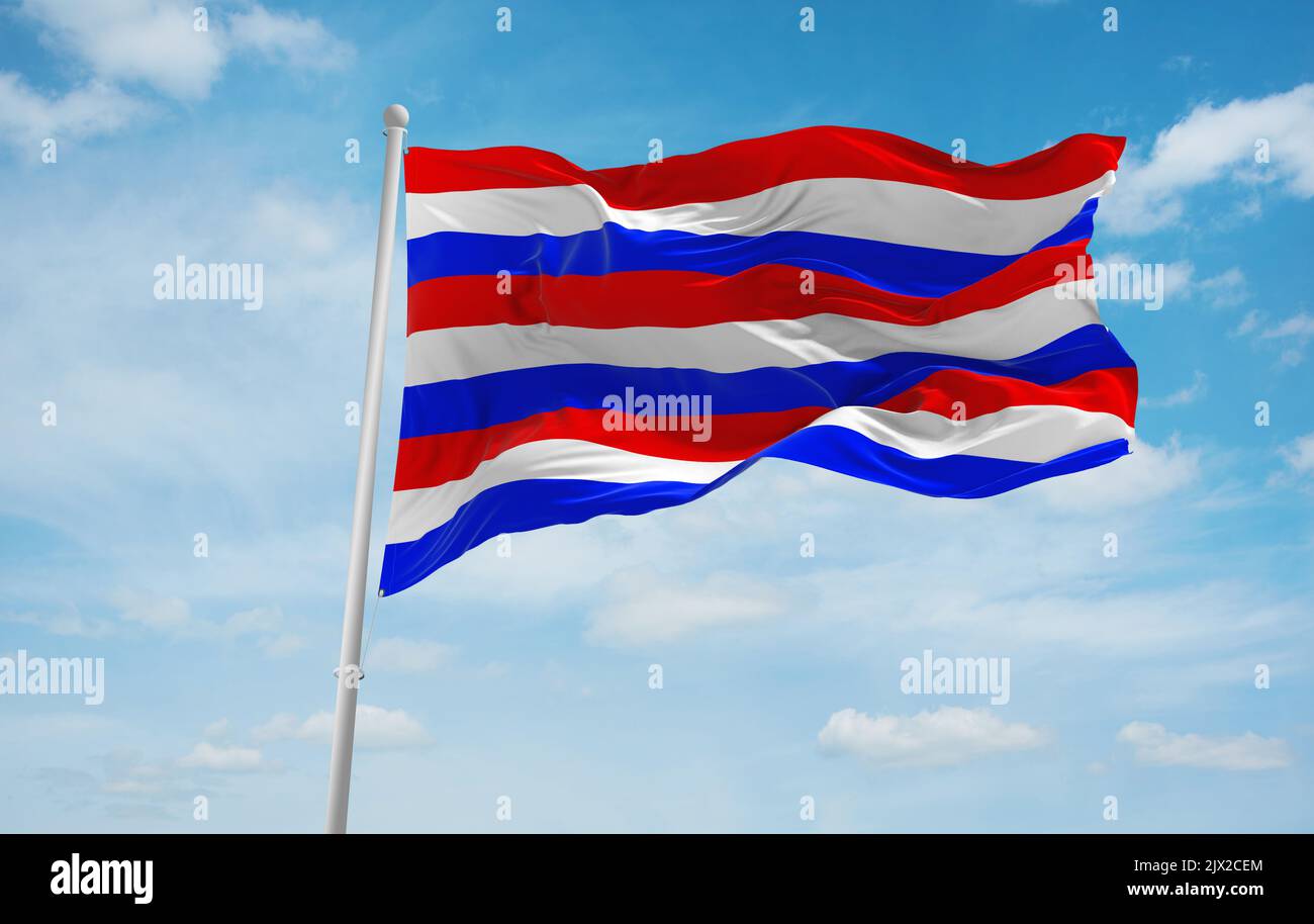 flag of Austronesian peoples Balinese people at cloudy sky background ...
