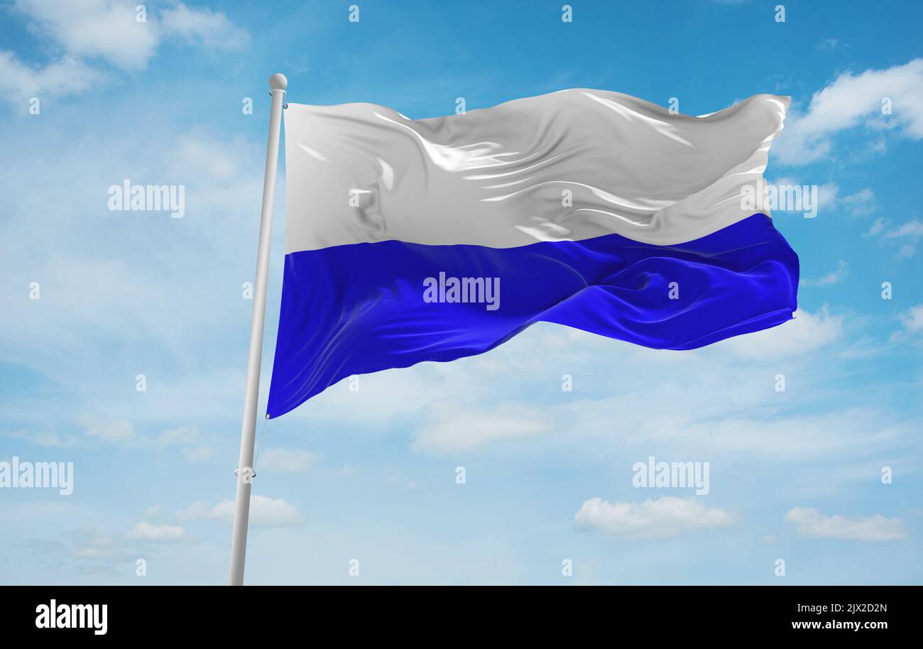 flag of Austronesian peoples Hiligaynons at cloudy sky background ...