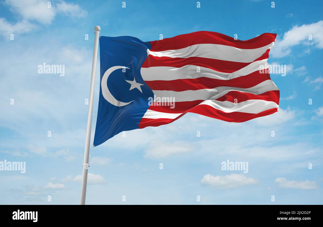 flag of Austronesian peoples Chams at cloudy sky background, panoramic ...