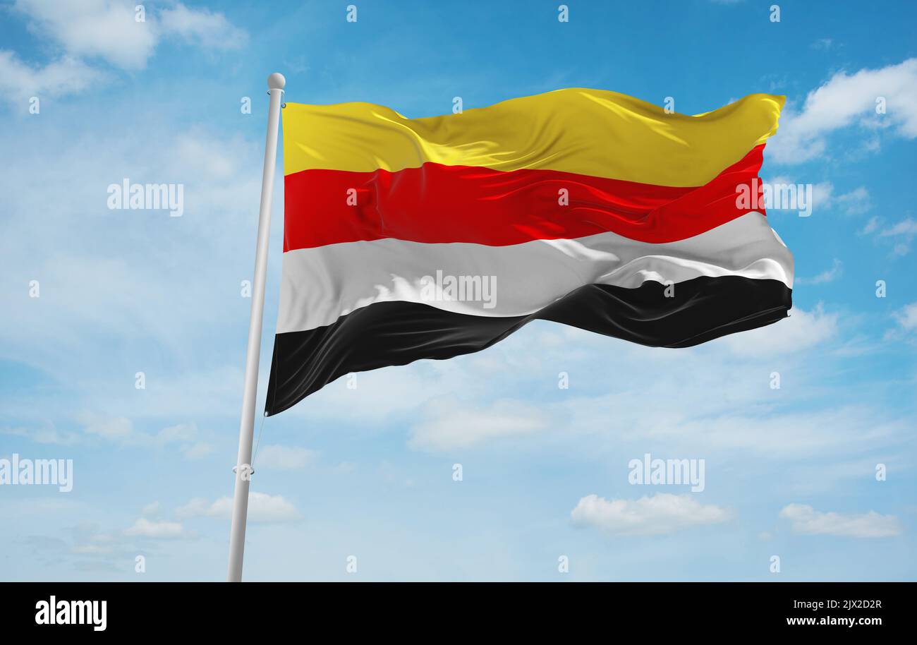 flag of Austronesian peoples Butonese people at cloudy sky background ...