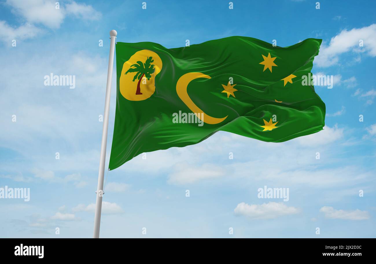 flag of Austronesian peoples Cocos Malays at cloudy sky background ...