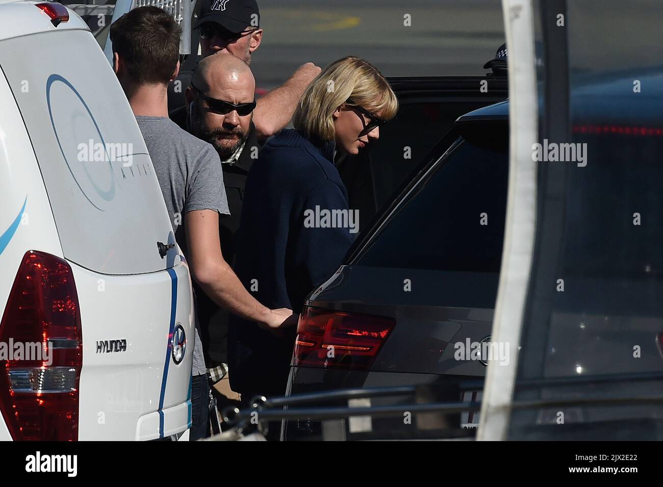 American singer Taylor Swift steps into a car as she and British actor ...