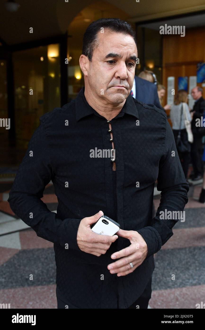 Former world champion boxer Jeff Fenech leaves the Downing Centre Court ...