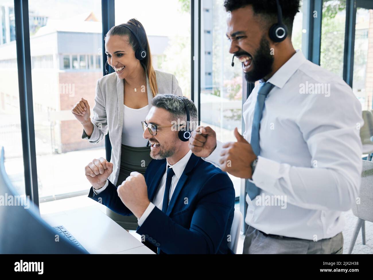Winning call center agency or online team celebration for target ...
