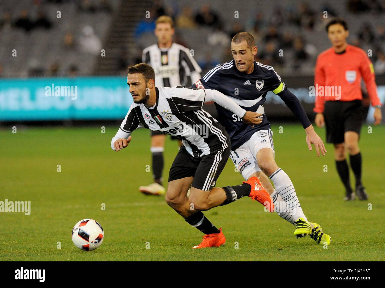 Grigoris Kastanos of Juventus beats Carl Valeri of the Victory for the ...