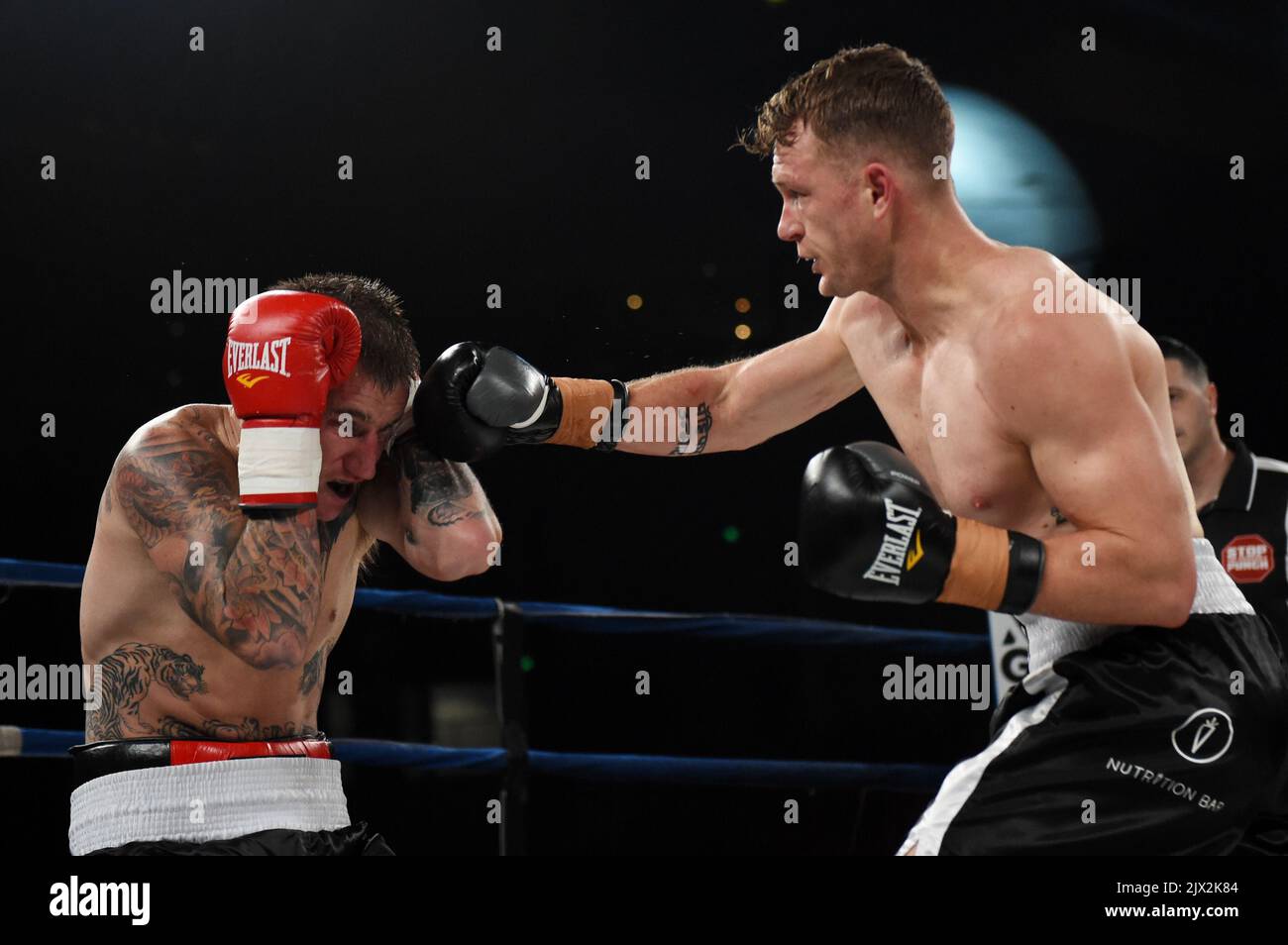 Paul Gould (left) fights Kayne Pettifer during their light heavy ...