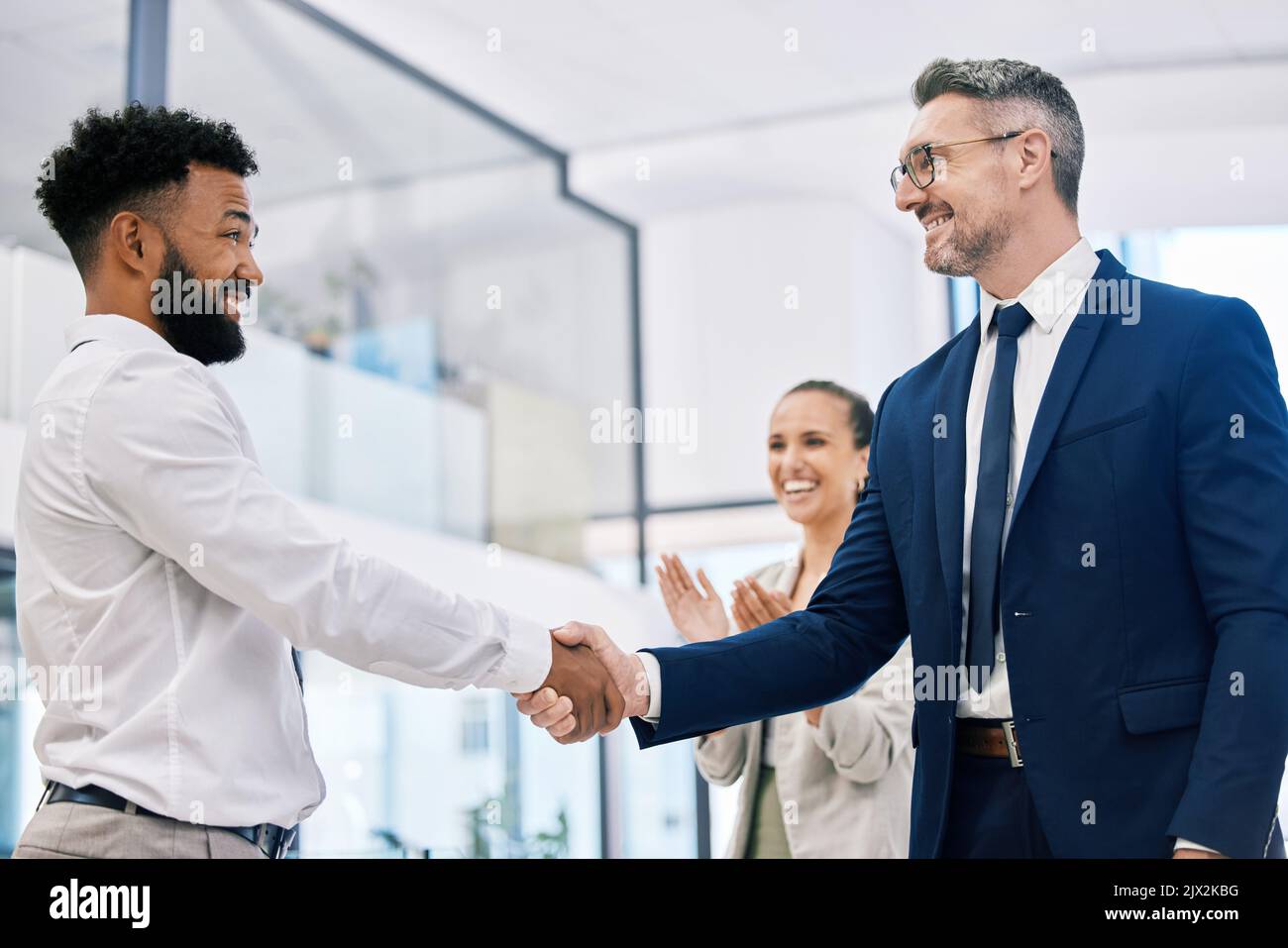 B2b, partnership and handshake deal with business team celebrating a ...