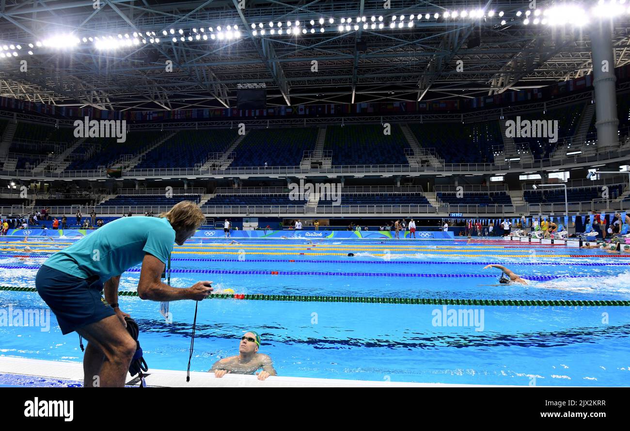 Coach Denis Cotterell interacts with Daniel Smith during the Australian ...