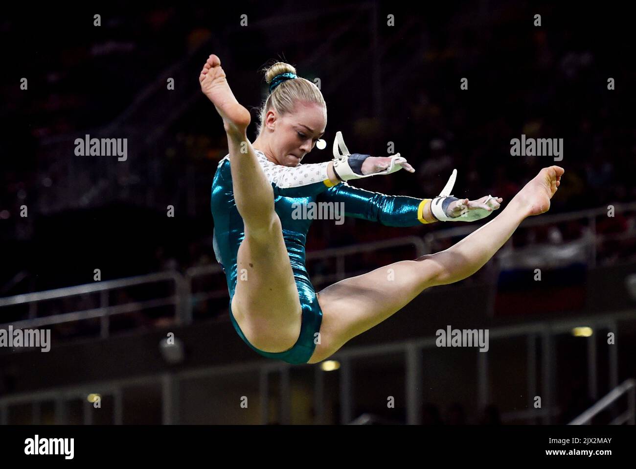 Australian gymnast Larrissa Miller performs on the uneven bars during ...
