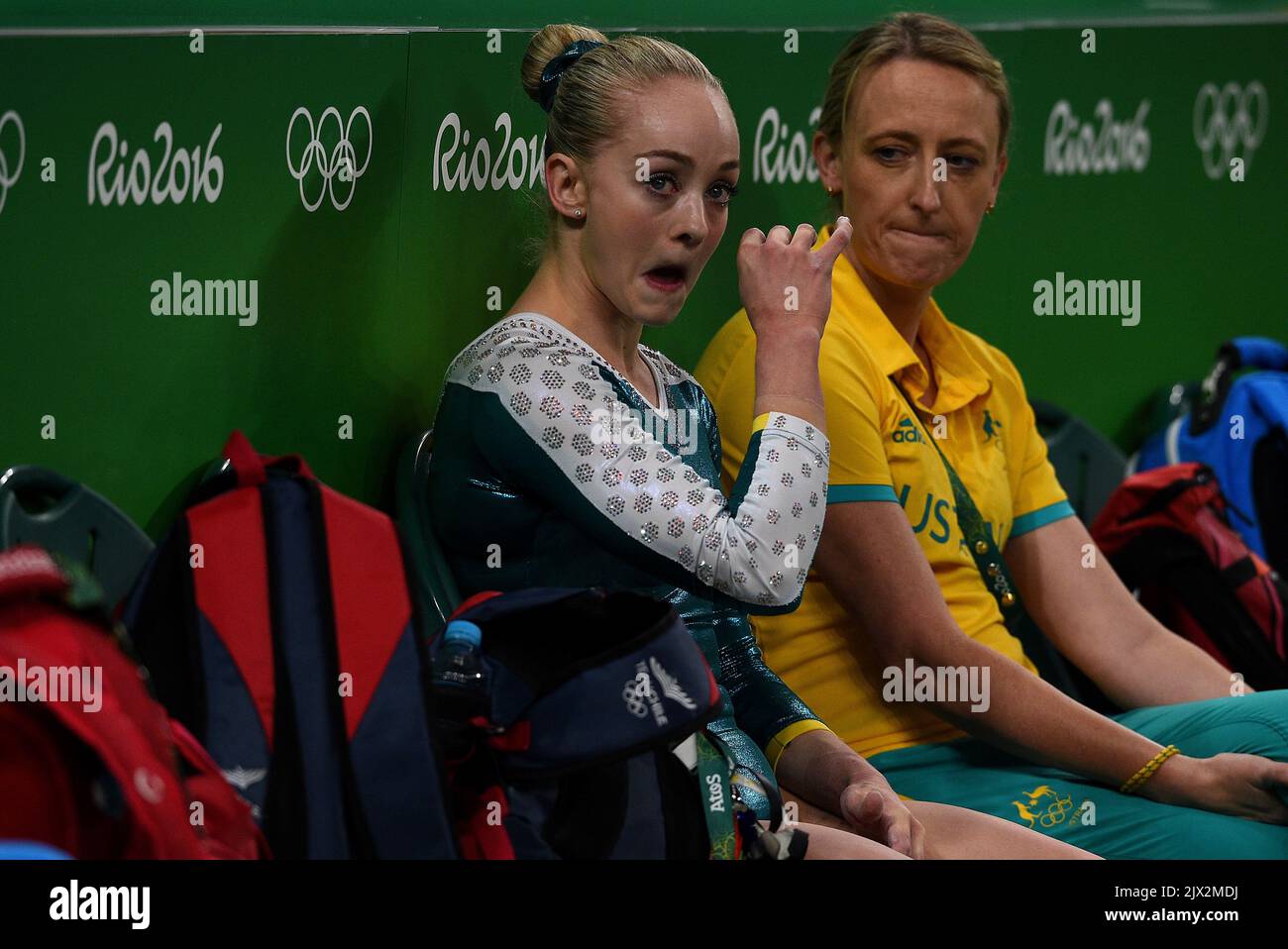 Australian gymnast Larrissa Miller reacts after her performance on the ...