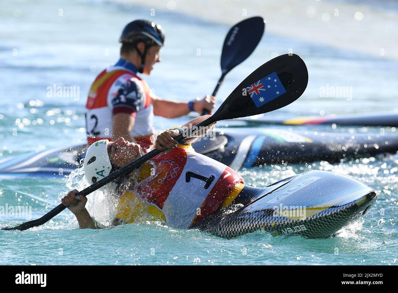 Jessica Fox of Australia takes a dip after winning the bronze medal in ...