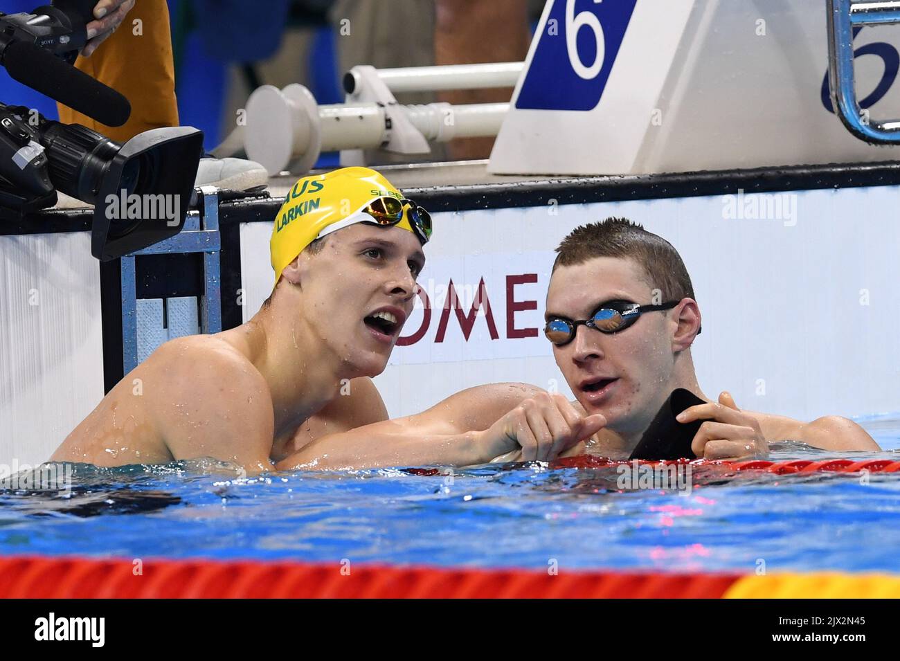 Mitchell Larkin of Australia contratulates Ryan Murphy of the United ...