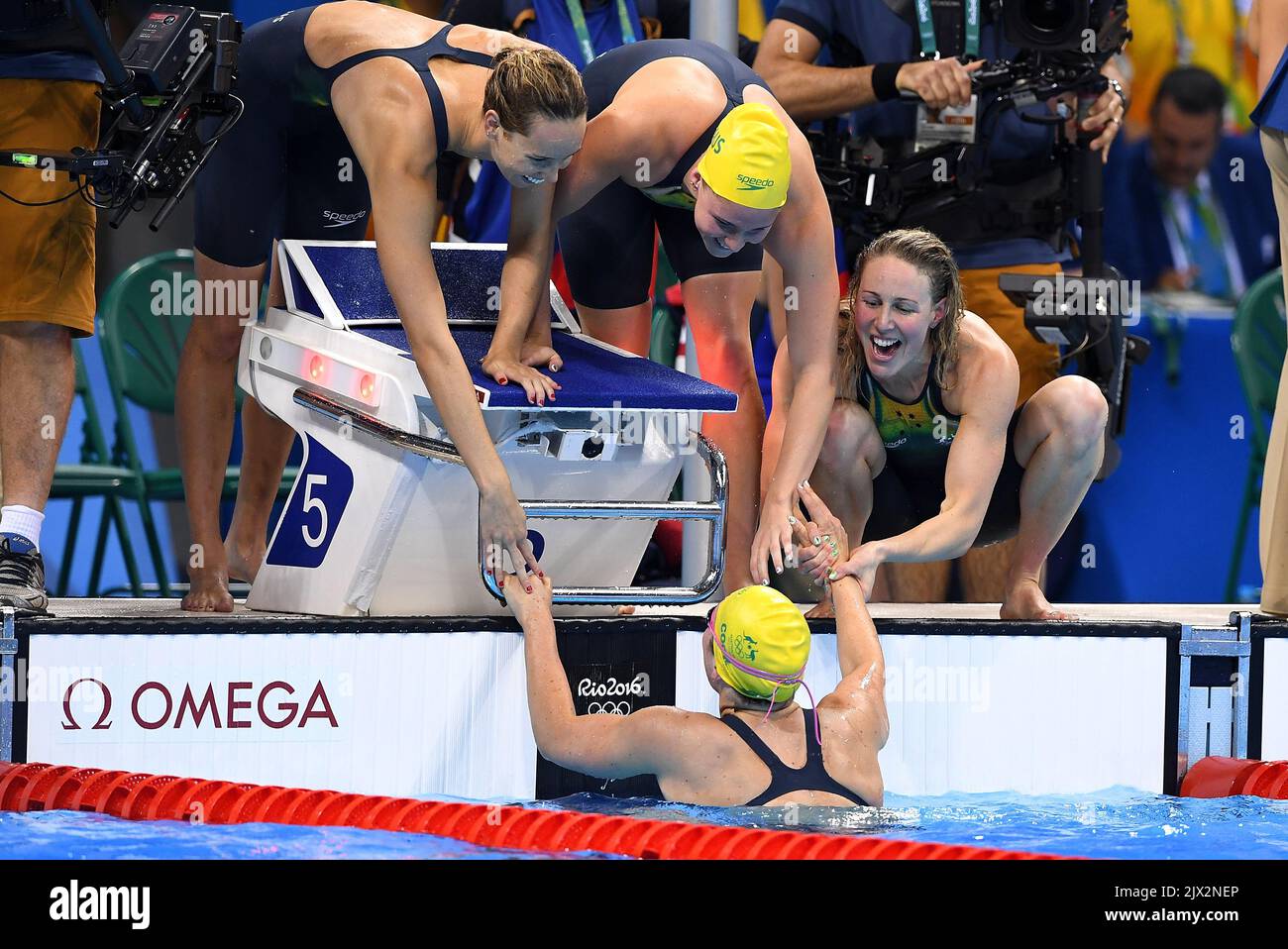 Australia's Tasmin Cook (in pool) celebrates with teammates Emma ...
