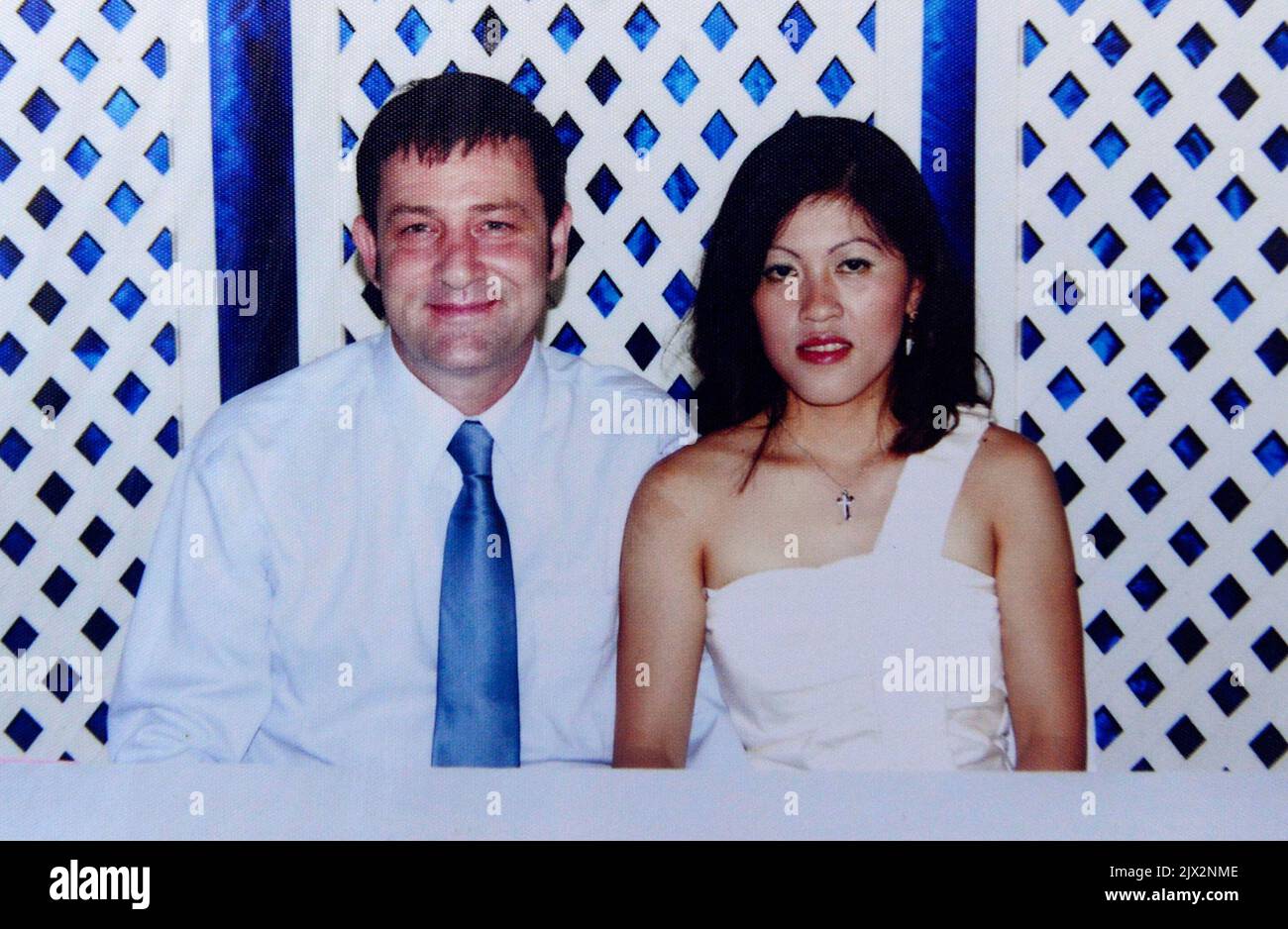 A copy of a photo from the wedding of Cory Ryther and Joan Canino ...