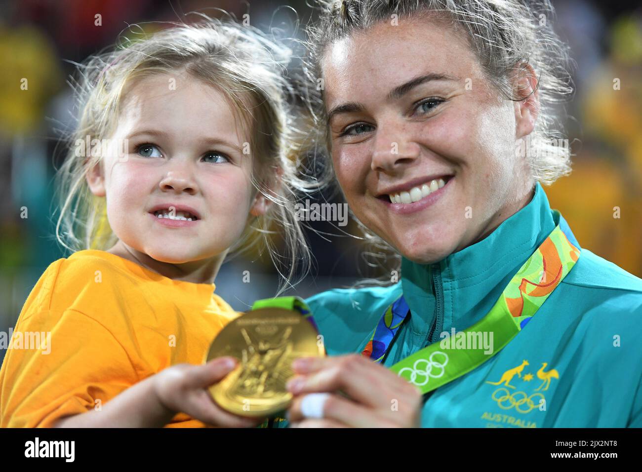 Australia's Nicole Beck with her daughter Sophie after their gold medal ...