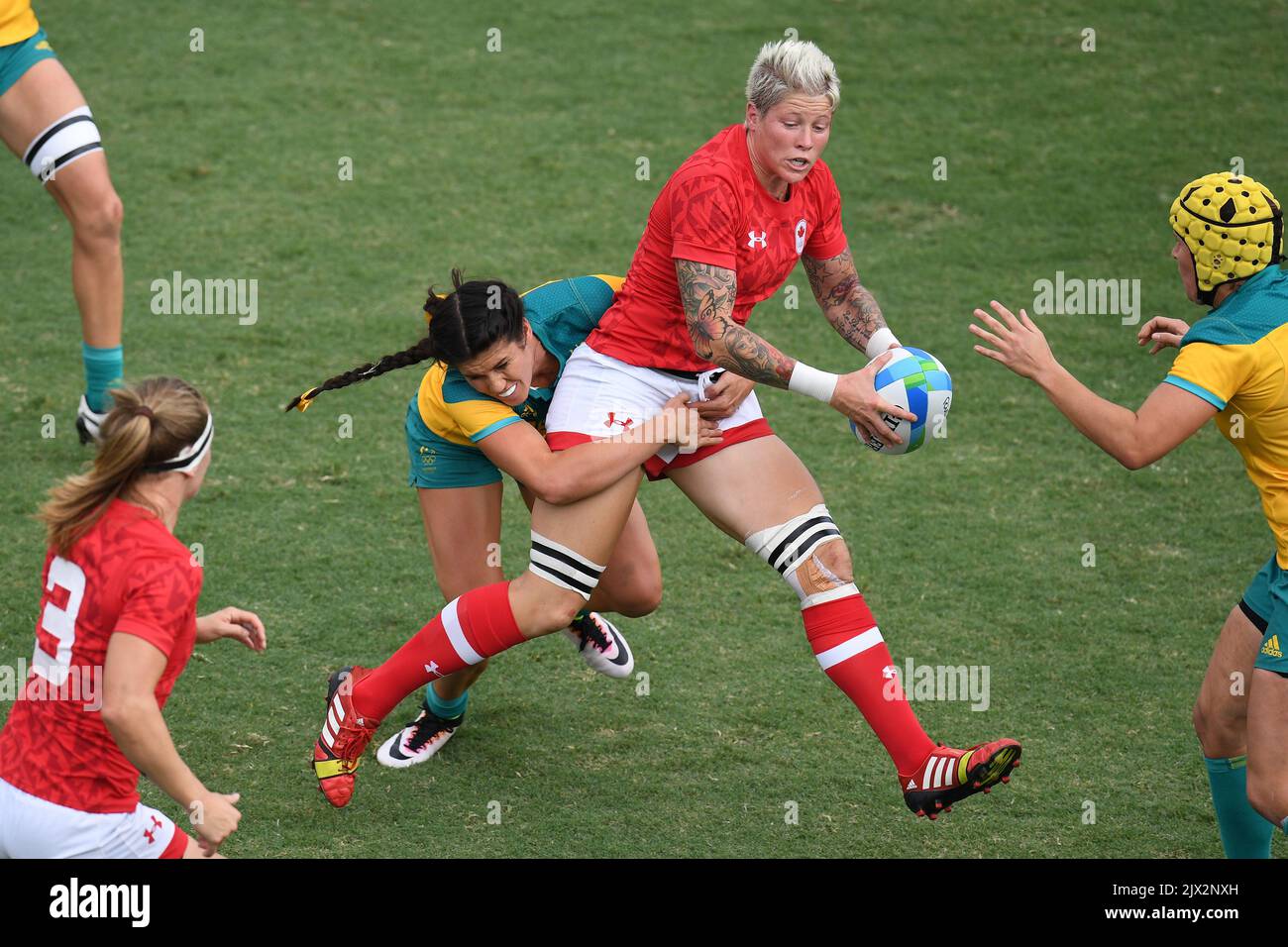 Australia's Charlotte Caslick tackles Canada's Jennifer Kish during ...