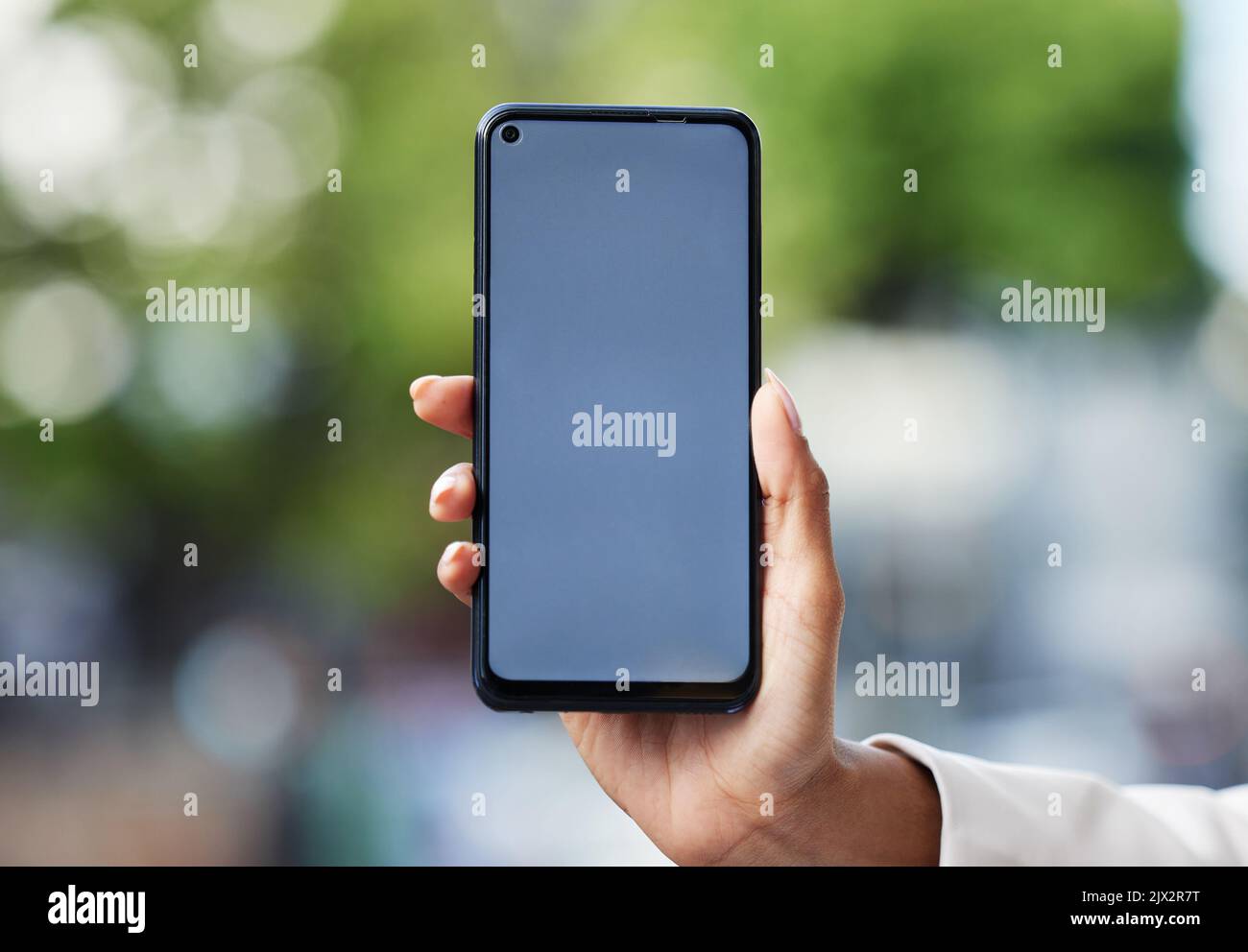 Phone screen hands city hi-res stock photography and images - Alamy