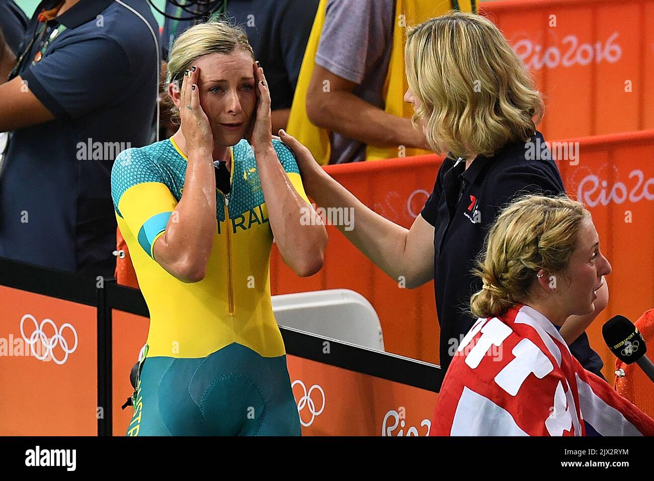 Annette Edmondson of Australia (left) reacts after placing 8th in the ...