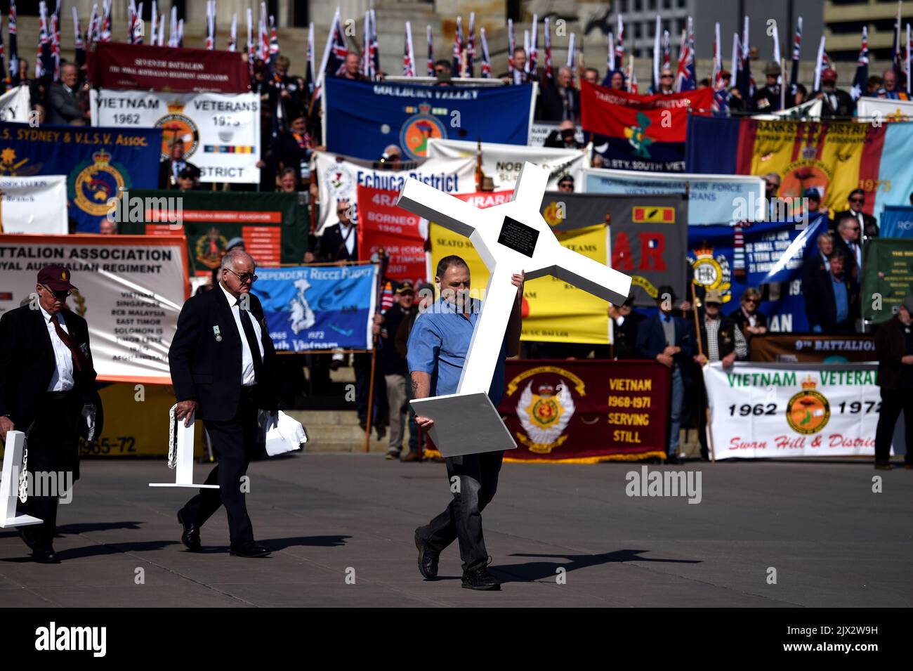 A recplica Long Tan cross is put in place during a service remembering ...