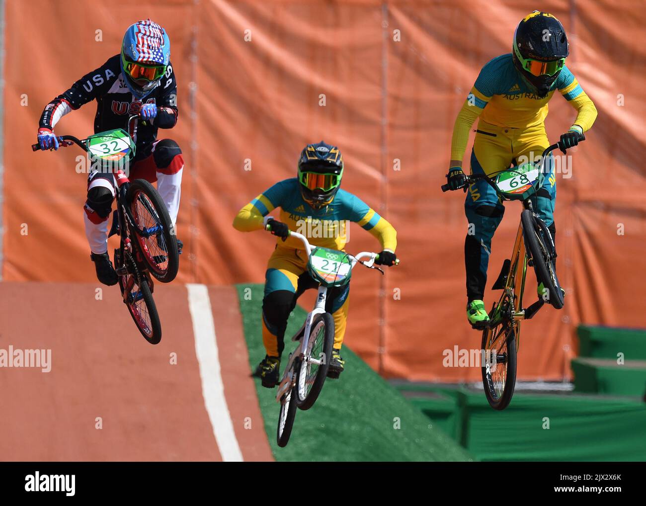 Caroline Buchanan (right) and Lauren Reynolds (centre) in action during ...