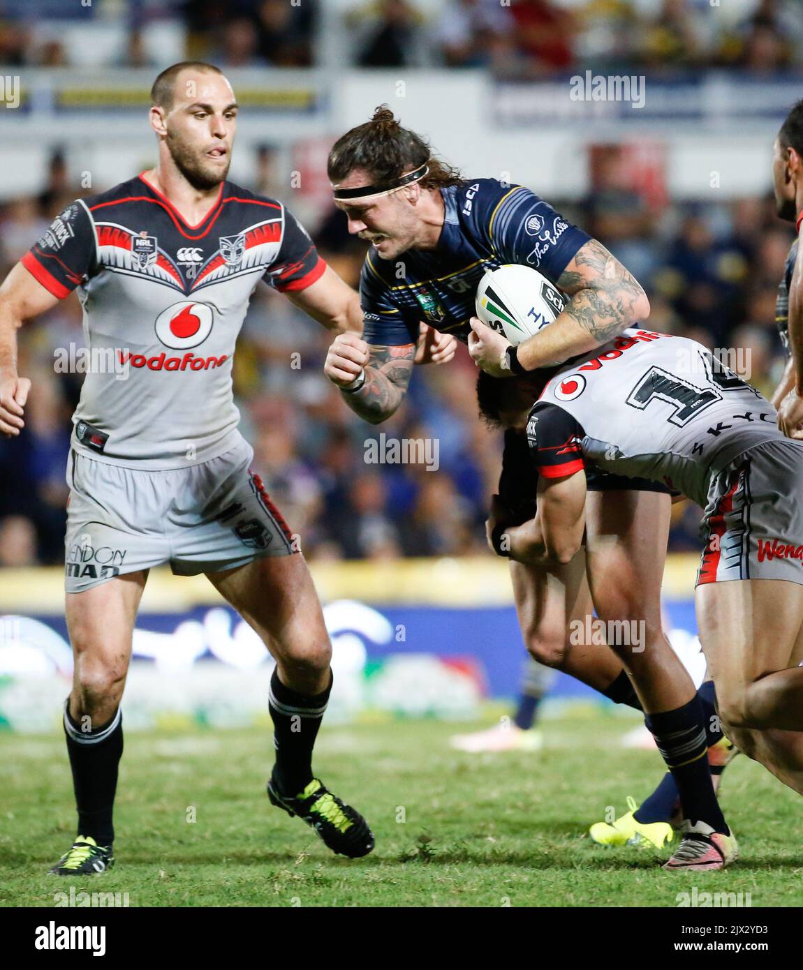 Cowboys Erthan Lowe tackled by Warriors Nathaniel Roache during the ...