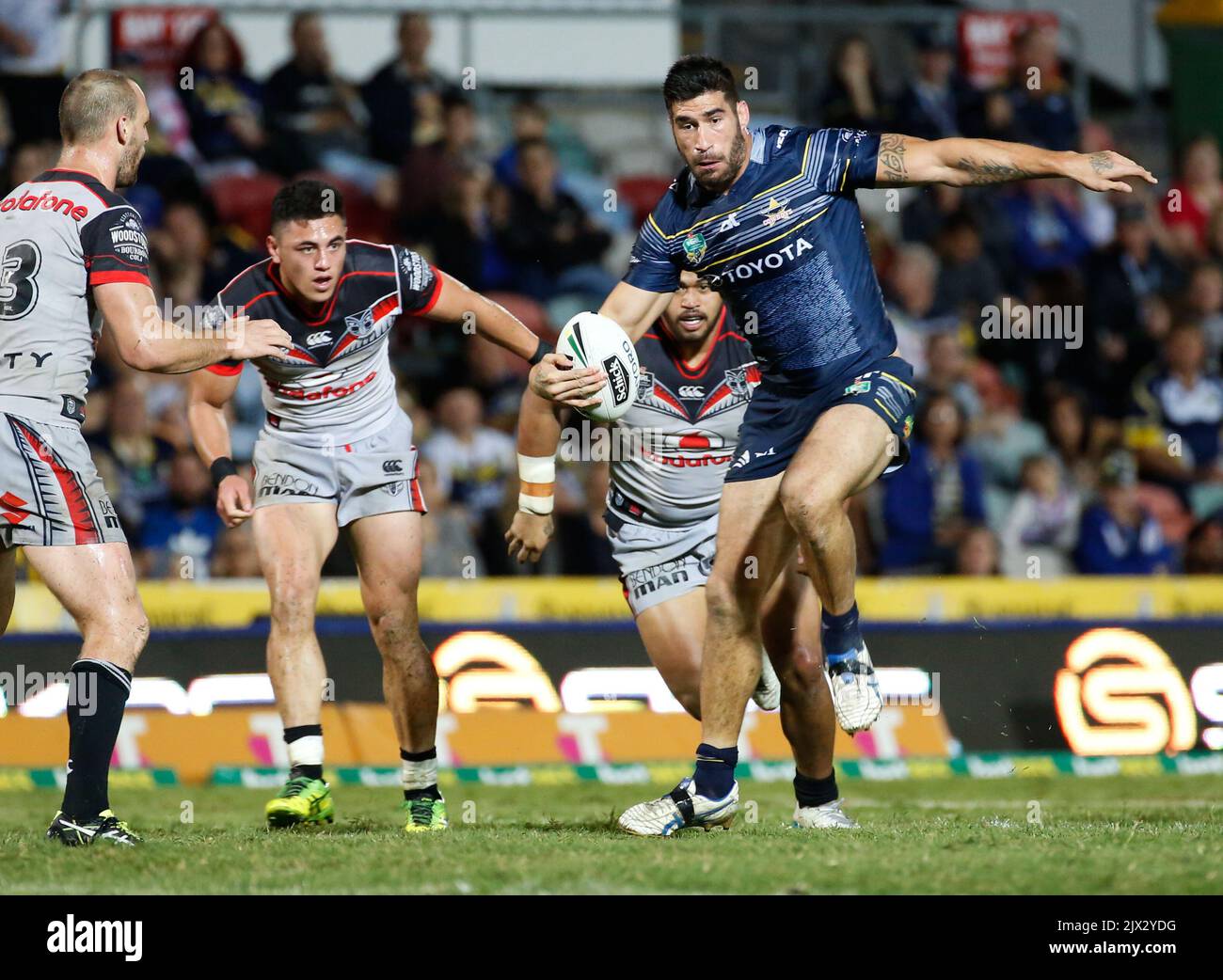 James Tamou of the Cowboys makes a break during the Round 24 NRL match ...