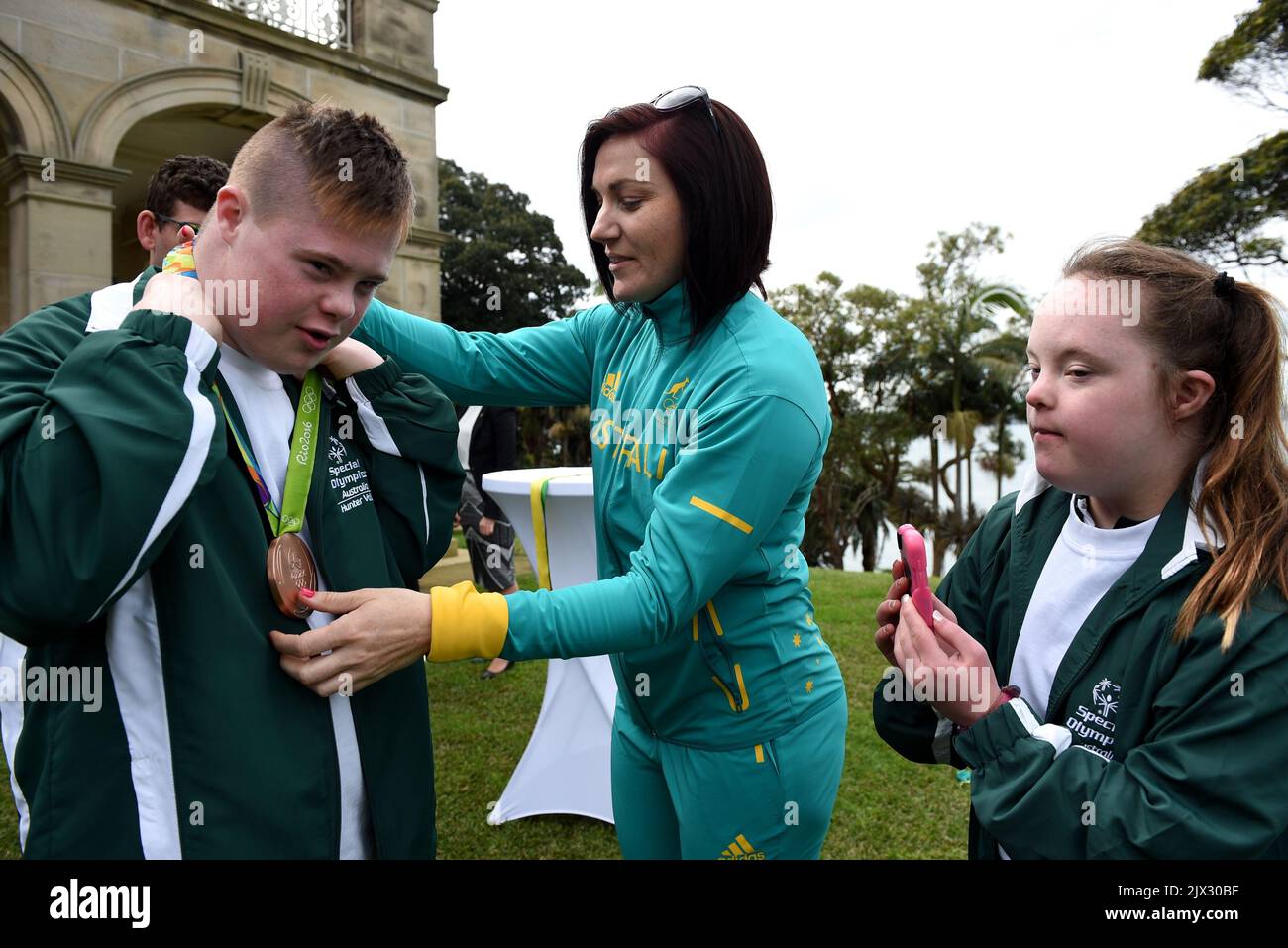 Australian Olympic cyclist Anna Meares shows her Bronze medal to ...