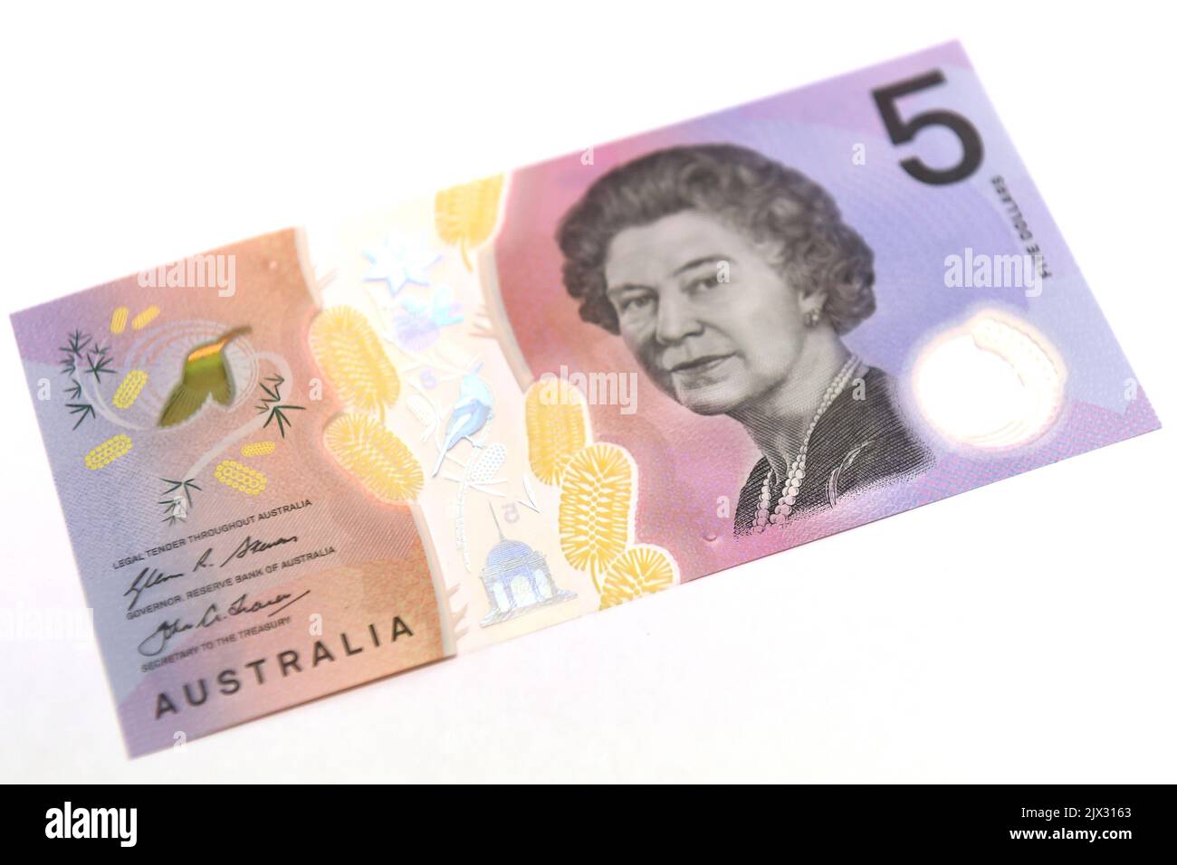 A new Australian five dollar banknote is displayed in Sydney on ...