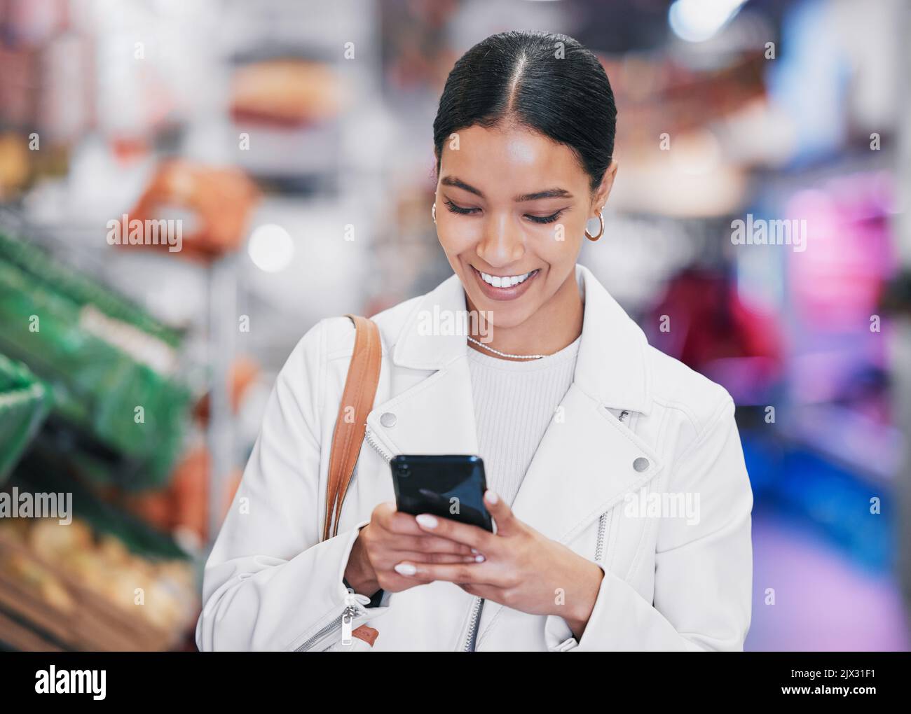 Supermarket, phone or woman with smile in food store doing research ...
