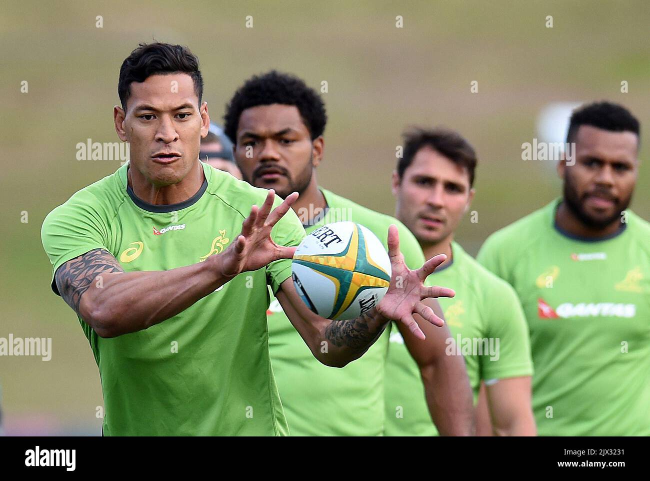 Wallabies player Israel Folau catches a ball during training in ...
