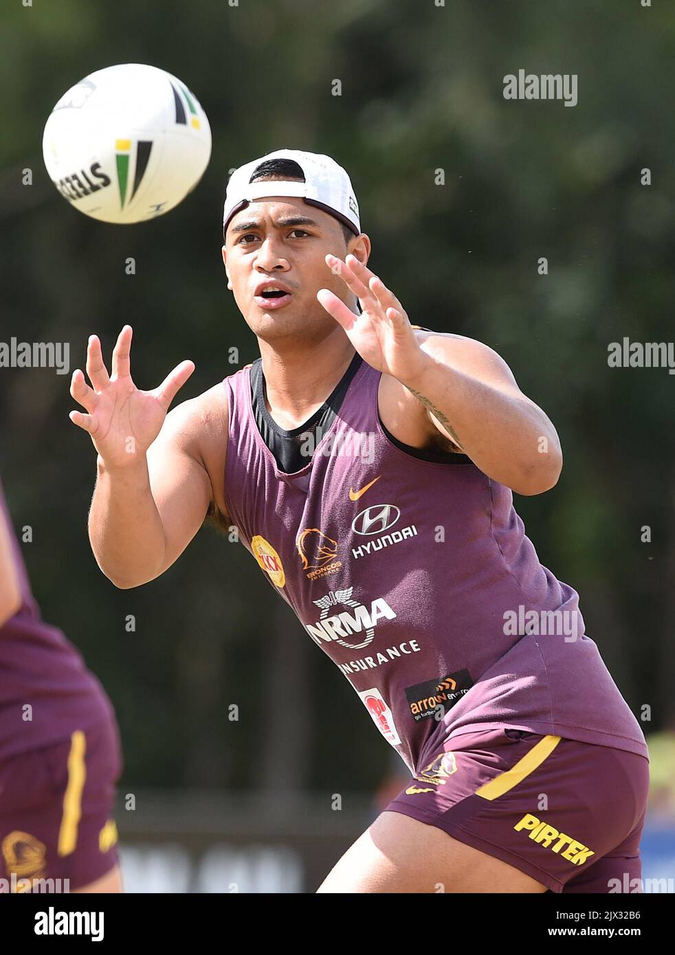 Anthony Milford receive the ball during the Brisbane Broncos training ...