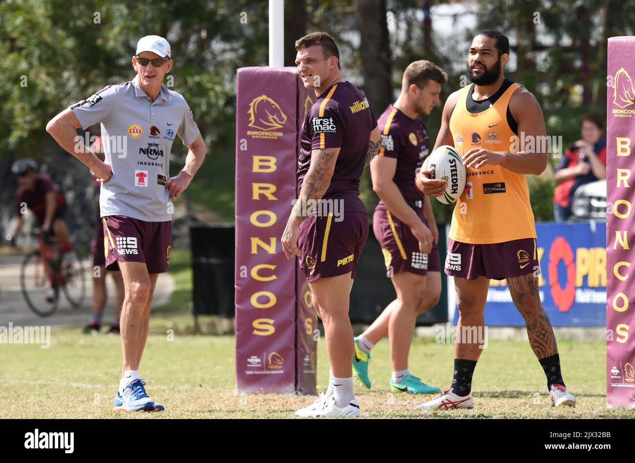 L to R; Coach Wayne Bennett, Josh McGuire and Adam Blair look on during ...