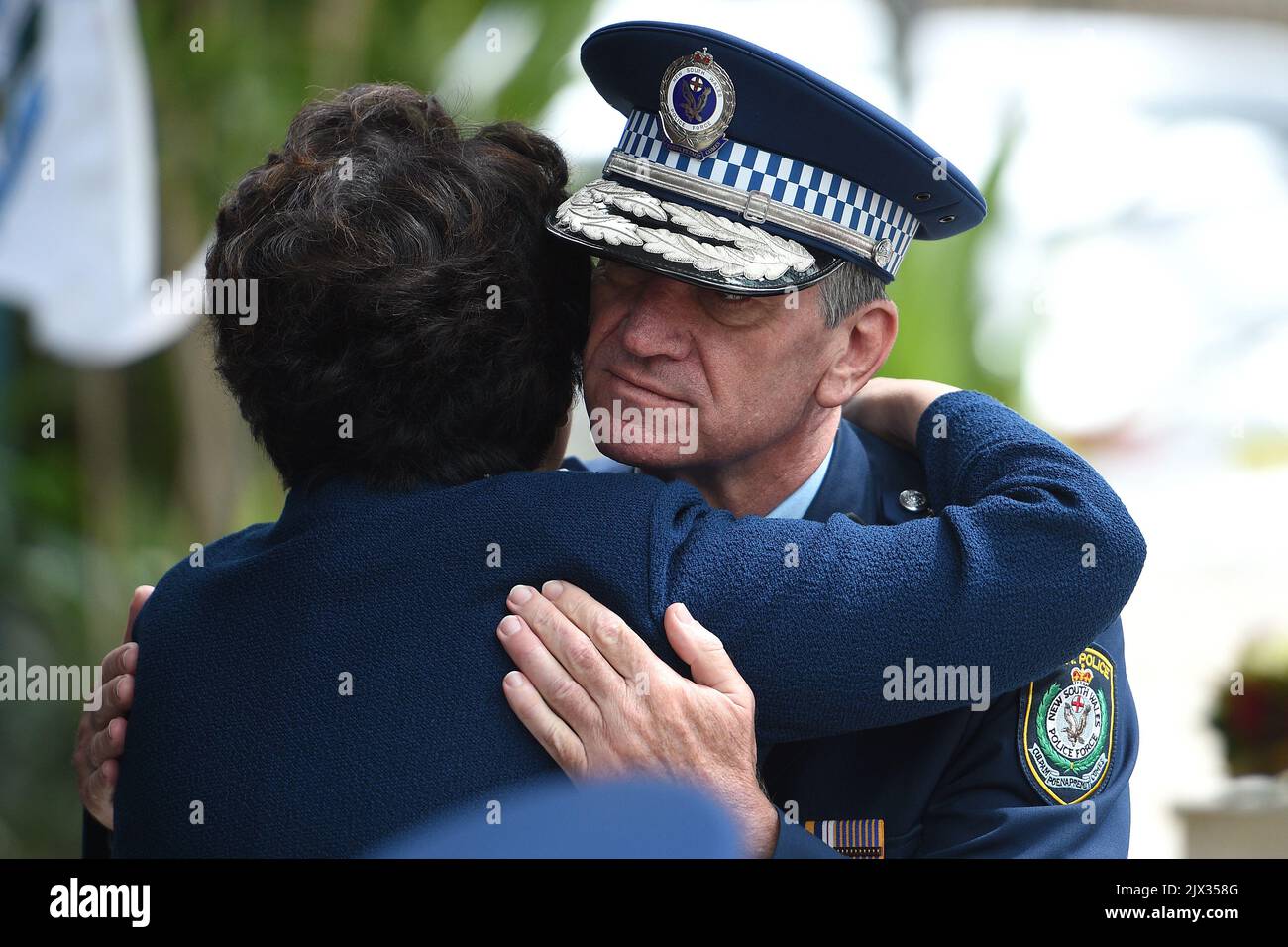 NSW Police Commissioner Andrew Scipione embraces Selina Cheng, the ...
