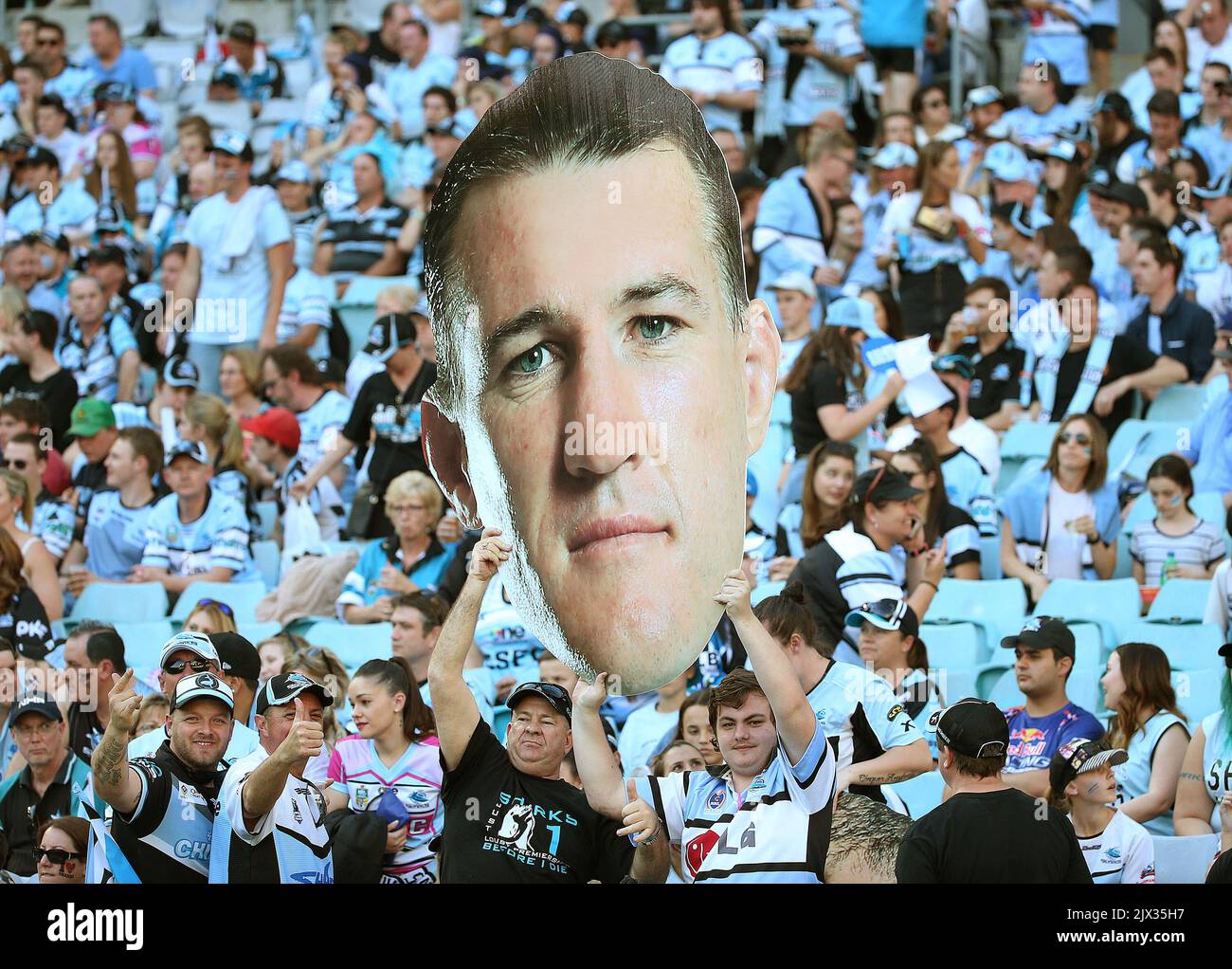 Sharks fans in the stadium hold a huge picture of Sharks team captain ...