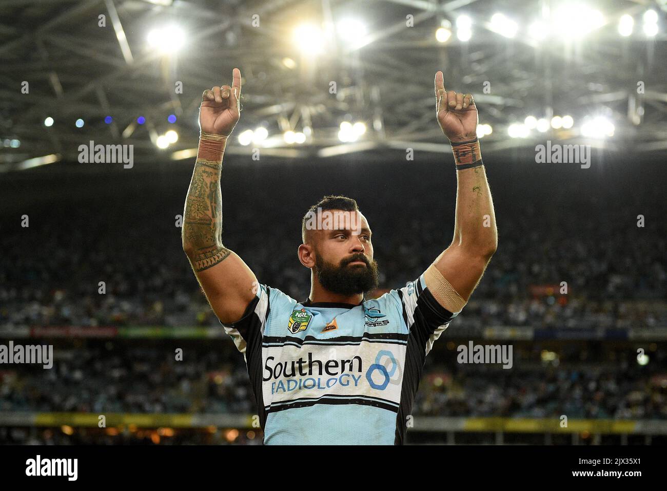 Jayson Bukuya of the Sharks gestures to the crowd following his team's ...