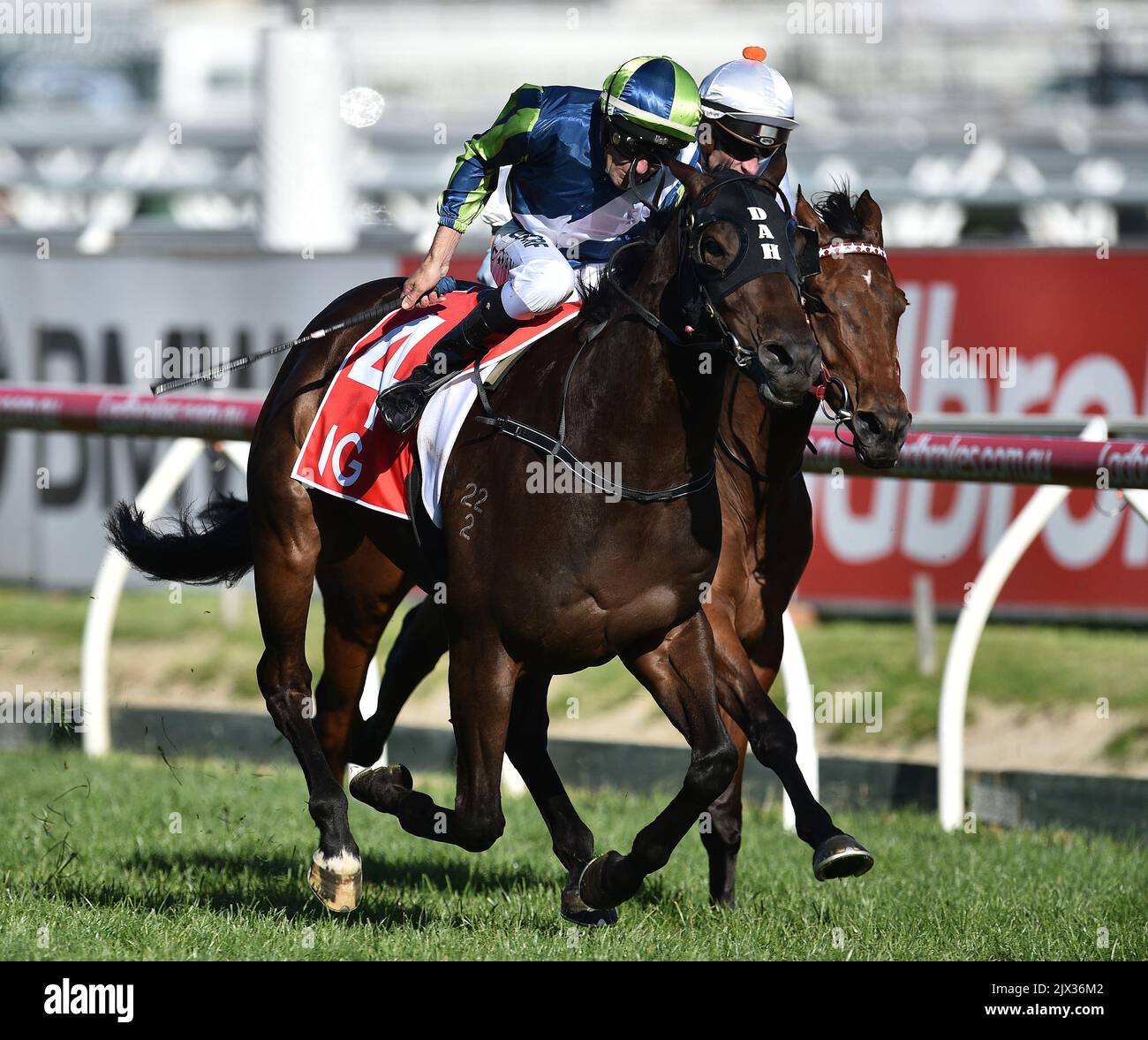 Dwayne Dunn (left) rides He's Our Rokkii to victory in the Toorak ...