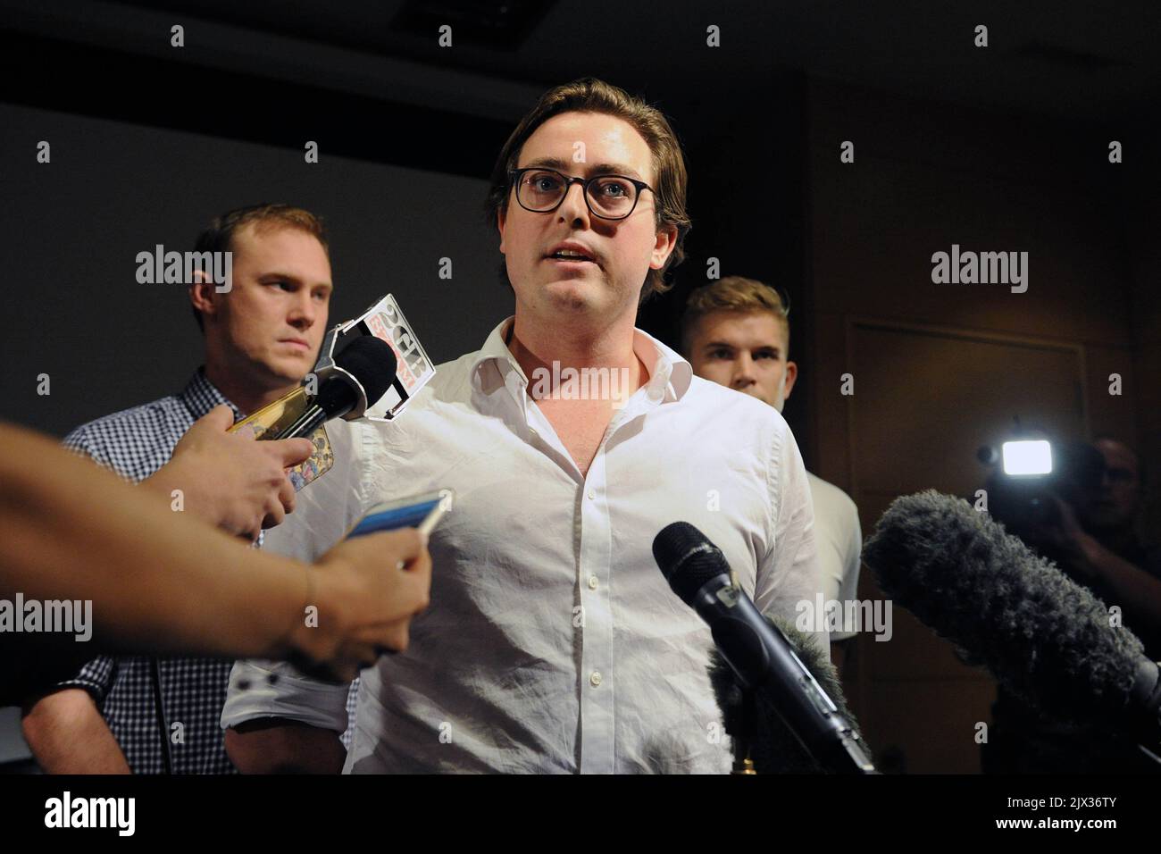 (L- R), Thomas Laslett, Nick Kelly and Edward Leaney, members of the ...