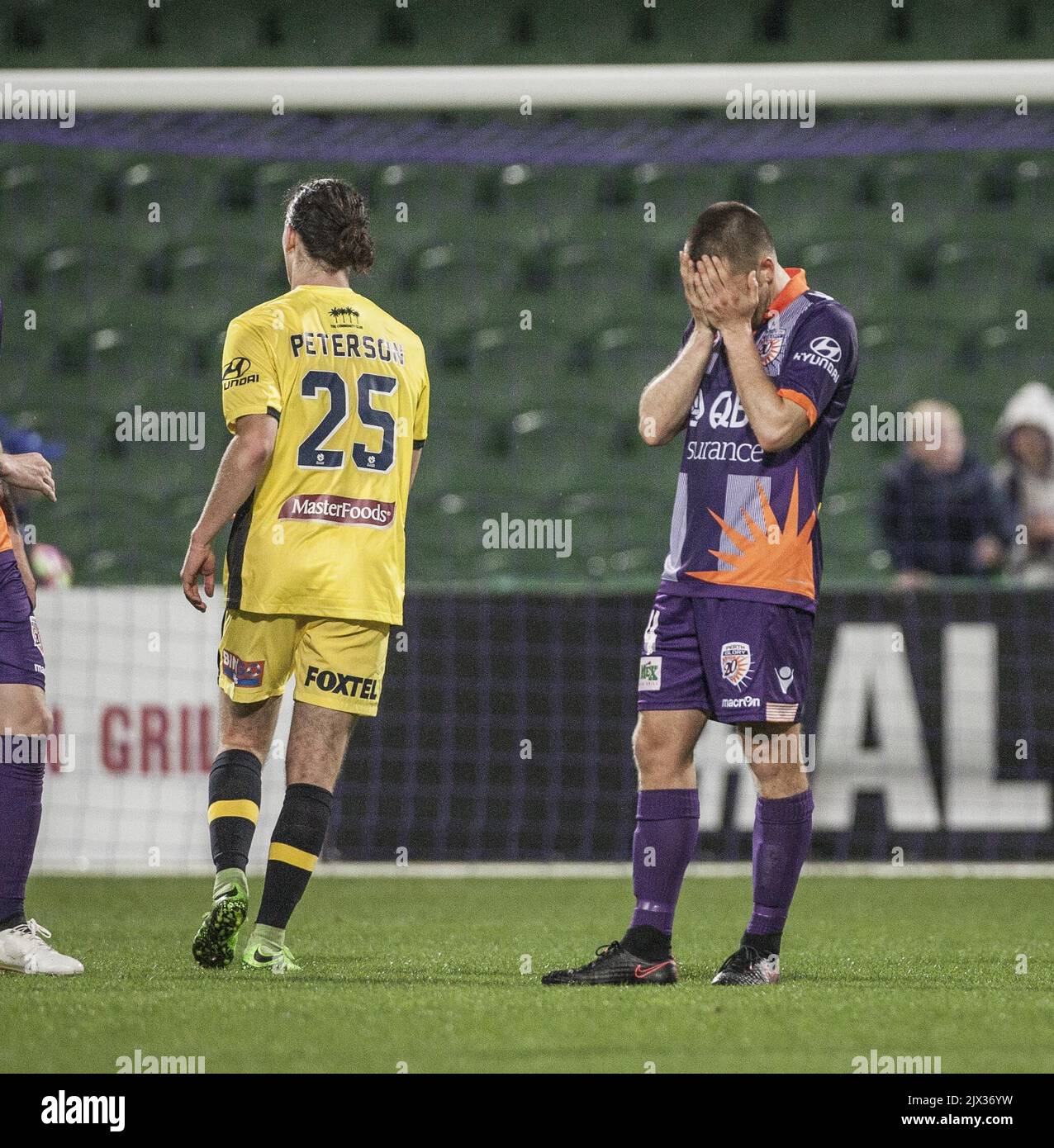 Chris Harold of the Perth Glory reacts to the final whistle during the ...
