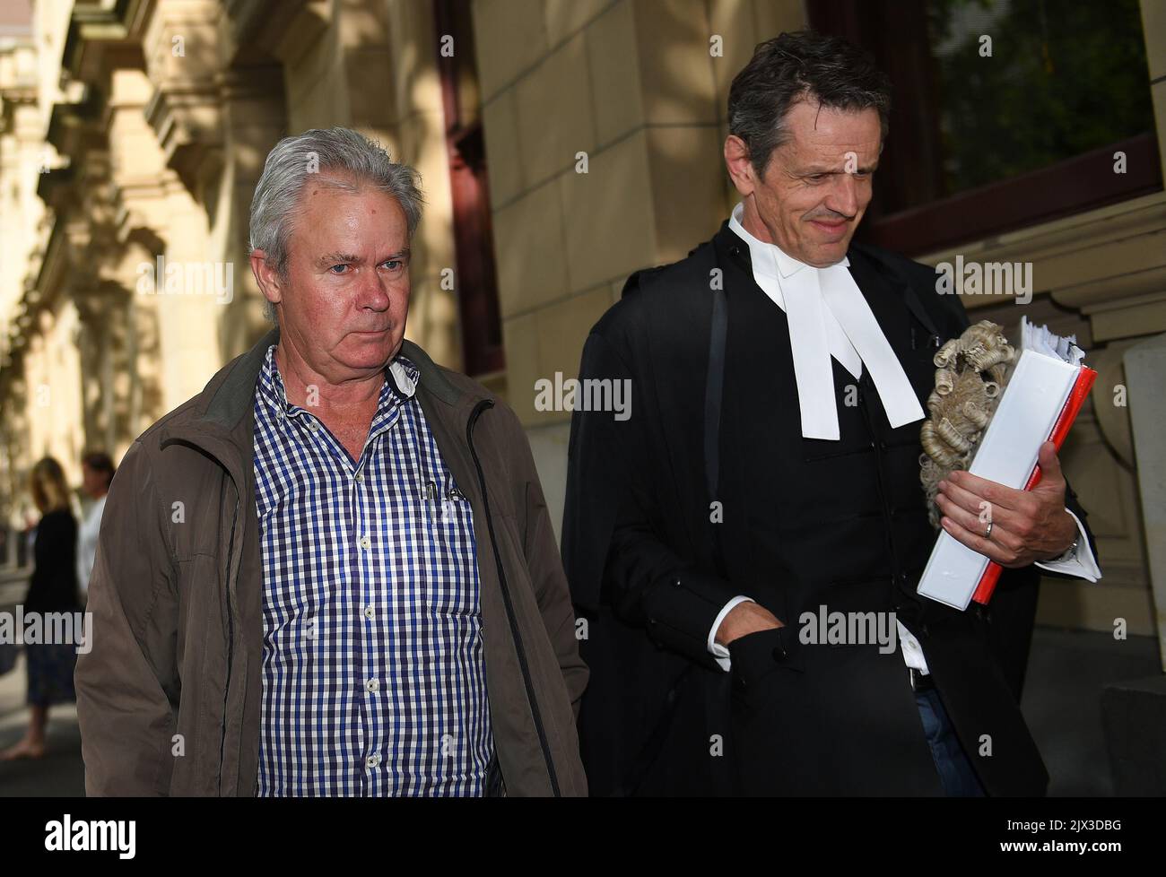 Melbourne art dealer Peter Stanley Gant (left) leaves the Supreme Court ...