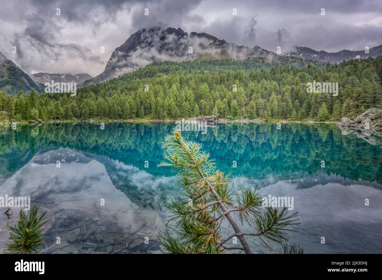 deep blue lake in the Val da Camp valley near Poschiavo, switzerland ...