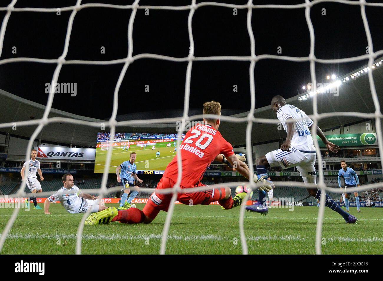 Sydney's David Carney's scores his second goal beating Victory's Jason ...