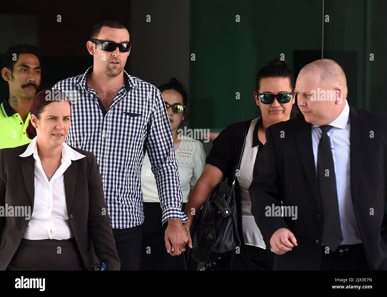 Lee Povey (2nd left) and his partner Anna Lisa Cruse (3rd left) leave ...