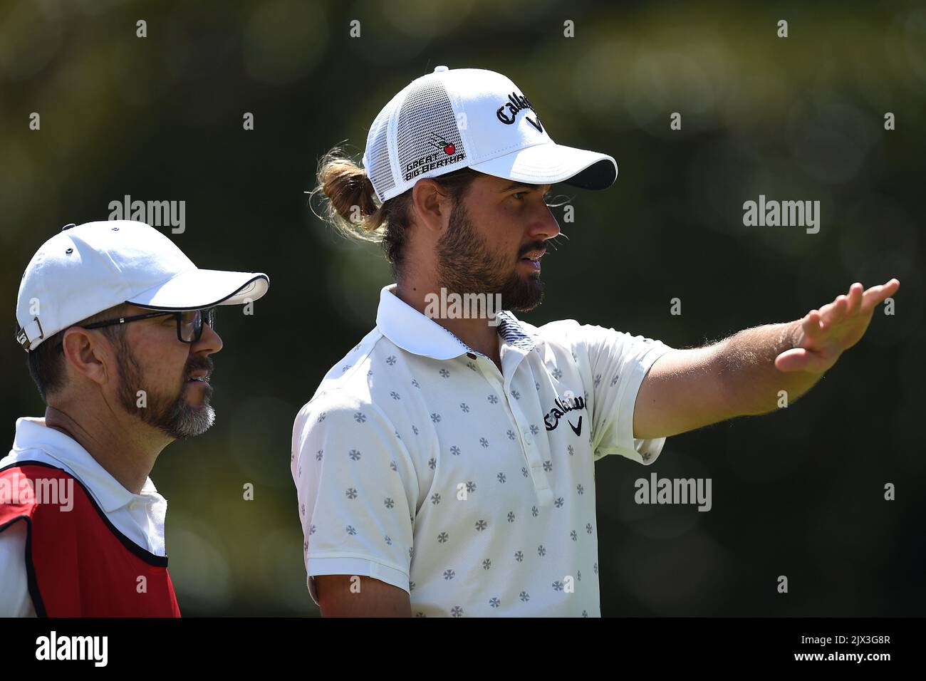 Australia's Curtis Luck speaks with his caddy on the 5th hole during ...
