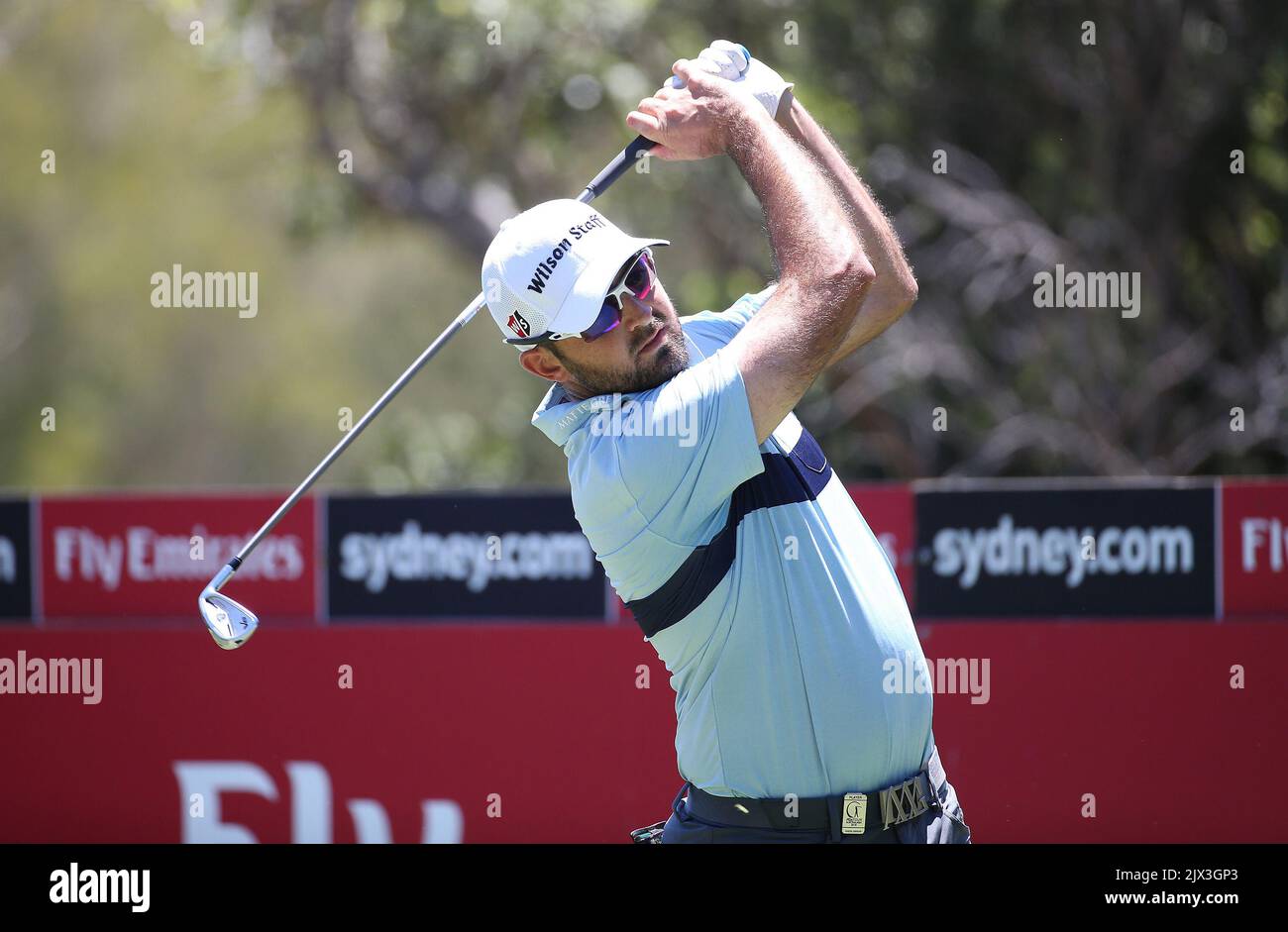 Australia's Rhein Gibson plays his first shot at the ninth hole during ...